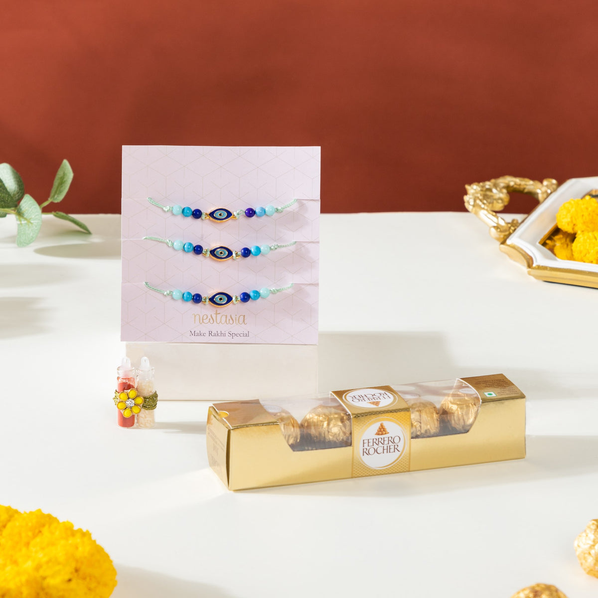 Rakhi Online - Shop Evil Eyes Rakhi Gift Set Online | Nestasia