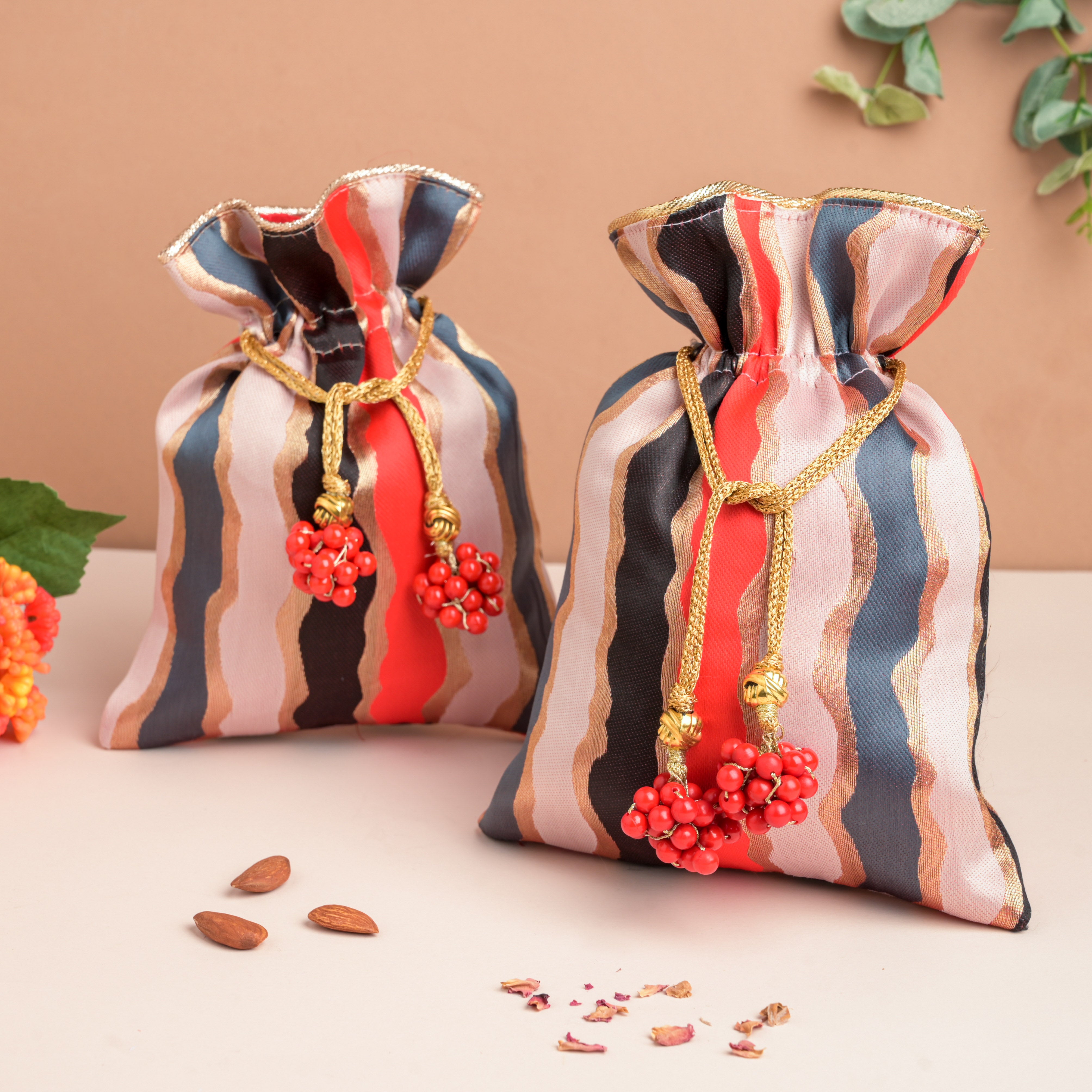 Red And Gold Festive Potli Set Of 2 Online - Premium Gift Hamper | Nestasia